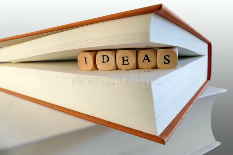 Ideas Message Written in Wooden Blocks between Book Pages Stock Image ...