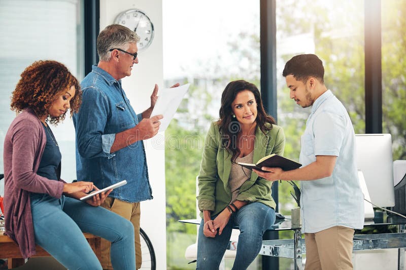 Ideas Shape the Course of Their Success. a Group of Creative Colleagues ...