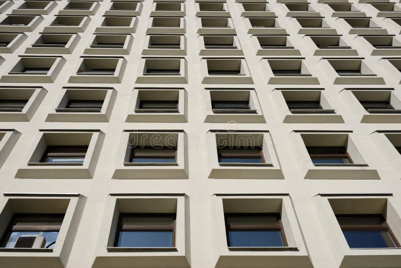 Identical Square Windows of a Concrete Building with Air Conditioning ...