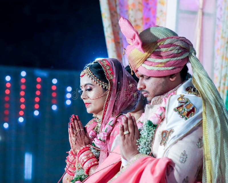 Idian Bride and Groom Praying - India Editorial Photo - Image of look ...