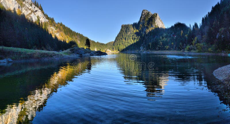 Idyllic Autumn Scene in the Alps with Mountain Lake Reflection Stock ...