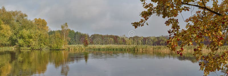 Idyllic Lake in Autumn with a Cloudy Sky Stock Photo - Image of autumn ...