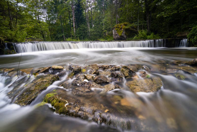 Idyllic River Landscape in the Forest with a Small Waterfall Stock ...