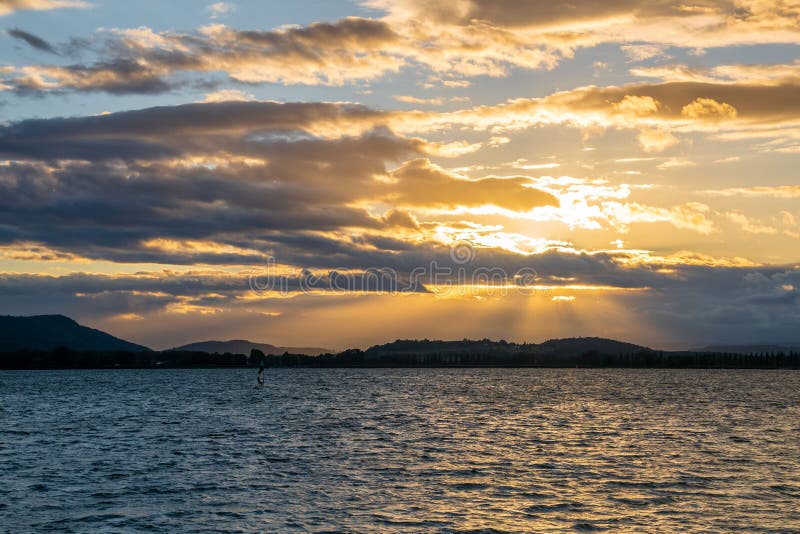 Idyllic Scenery of a Lake Reflecting the Sun Rays Stock Photo - Image ...