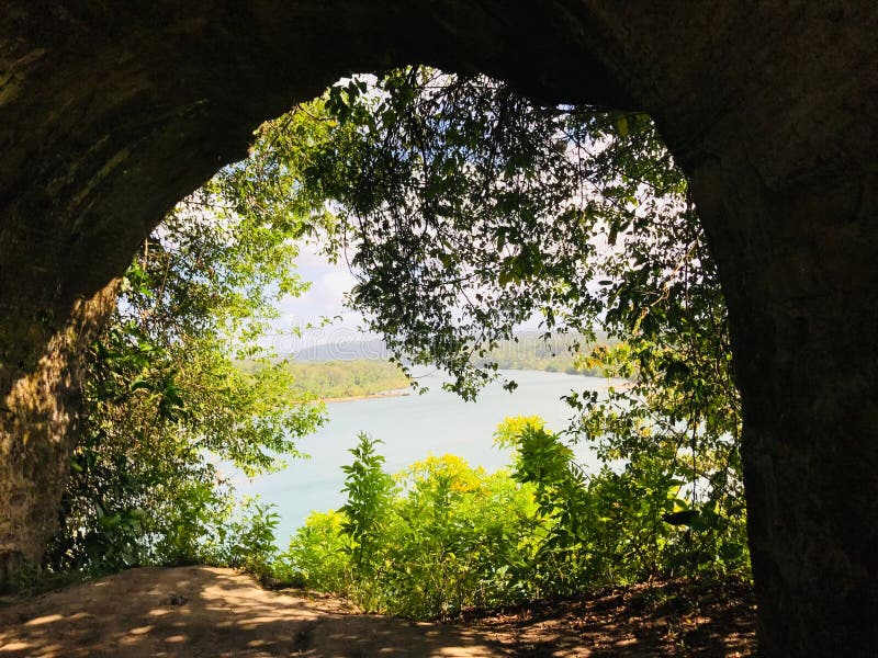 Idyllic View of a River from an Arched Cave Stock Photo - Image of ...