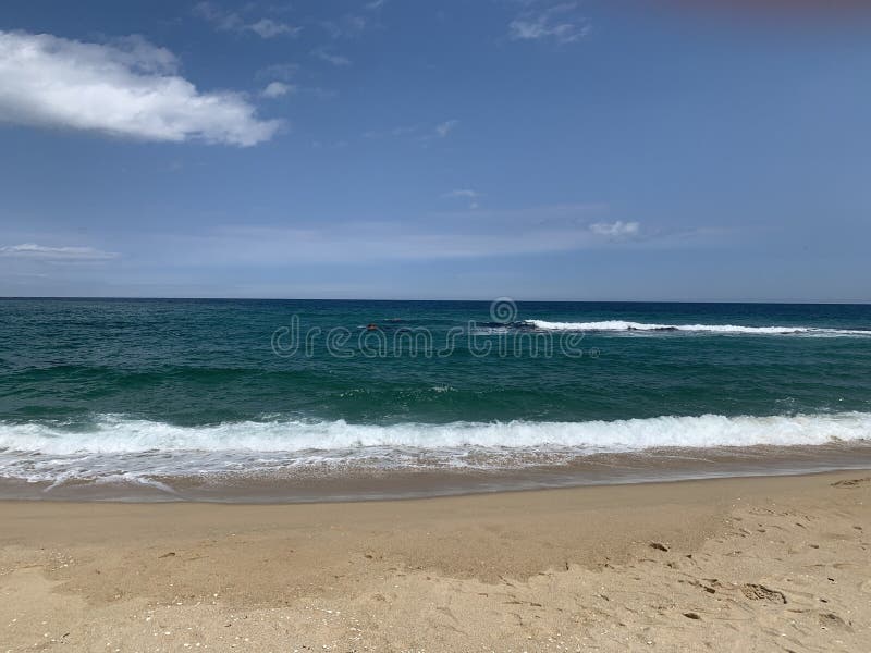 Idyllic View of a Tropical Beach with Waves Reaching a Sandy Shore ...