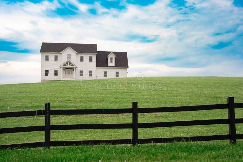Idyllic White Home with Grassy Green Lawn with Blue Sky Stock Image ...