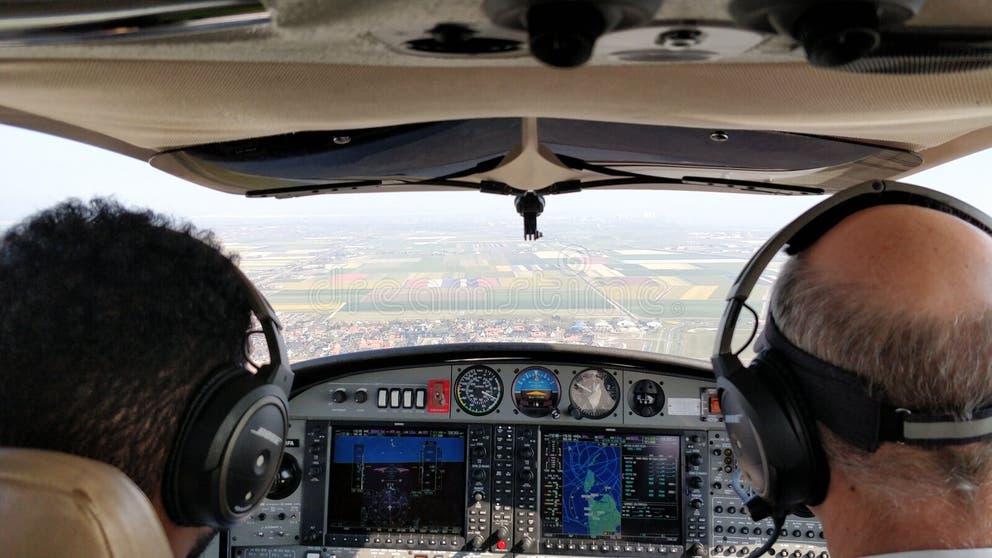 IFR Pilot Student and Flight Instructor on Final Approach in a Diamond ...