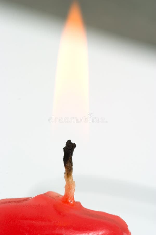 Ignited red candle stock photo. Image of candle, blow, dinner - 821942