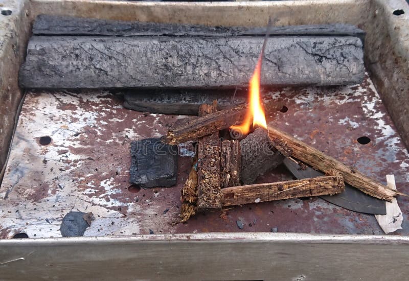 Igniting Fire for Grill stock image. Image of meat, fire - 285051003