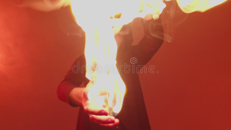 A Fire Mage in a Robe with a Large Hood, Holding His Hands Outstretched ...