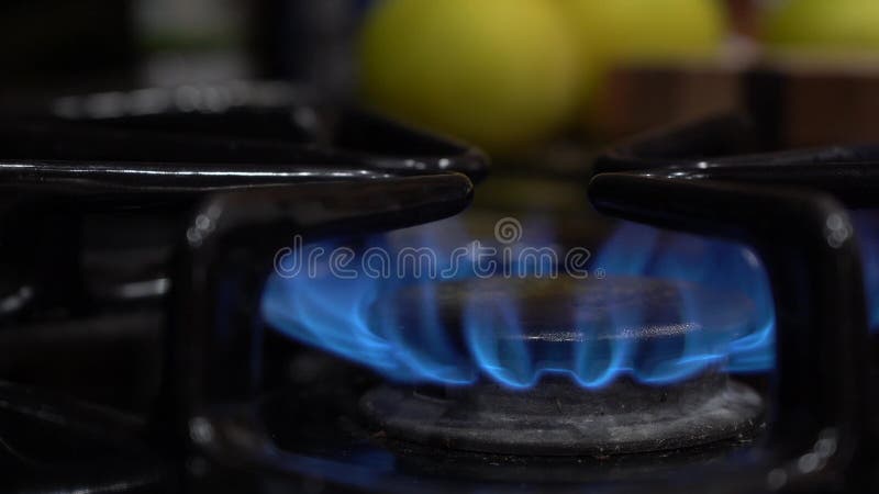 Black Gas Stove on Kitchen Countertop, 4 Burners Burning, Gas Stock ...