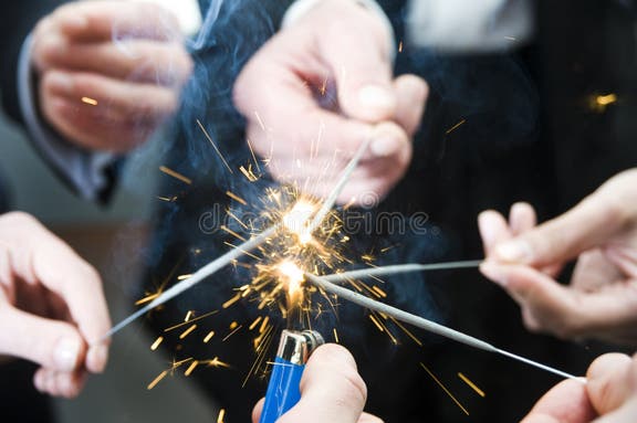 Igniting spark sticks stock image. Image of sticks, fingers - 13139295