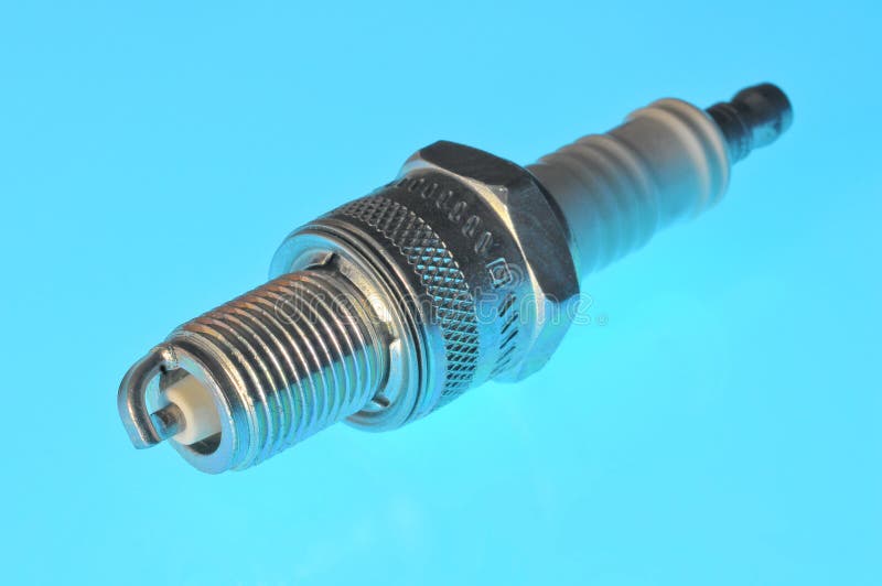 Ignition plug on blue stock image. Image of engine, ignition - 15048971