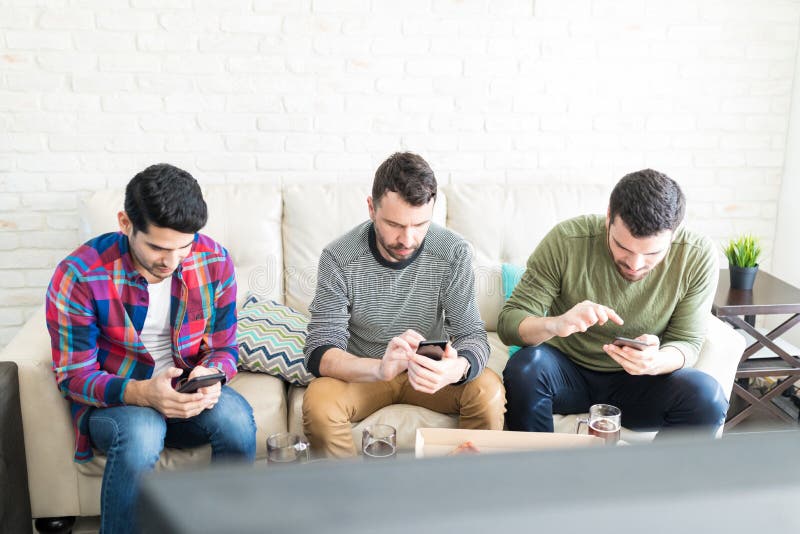 Ignoring Each Other while Using Phones at Party Stock Photo - Image of ...