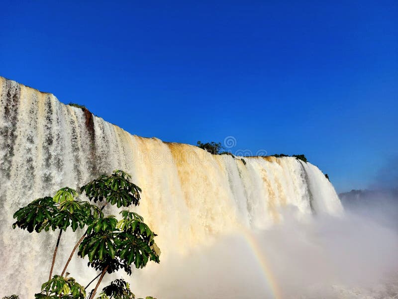 Iguazu falls blue sky stock photo. Image of falls, blue - 250331524