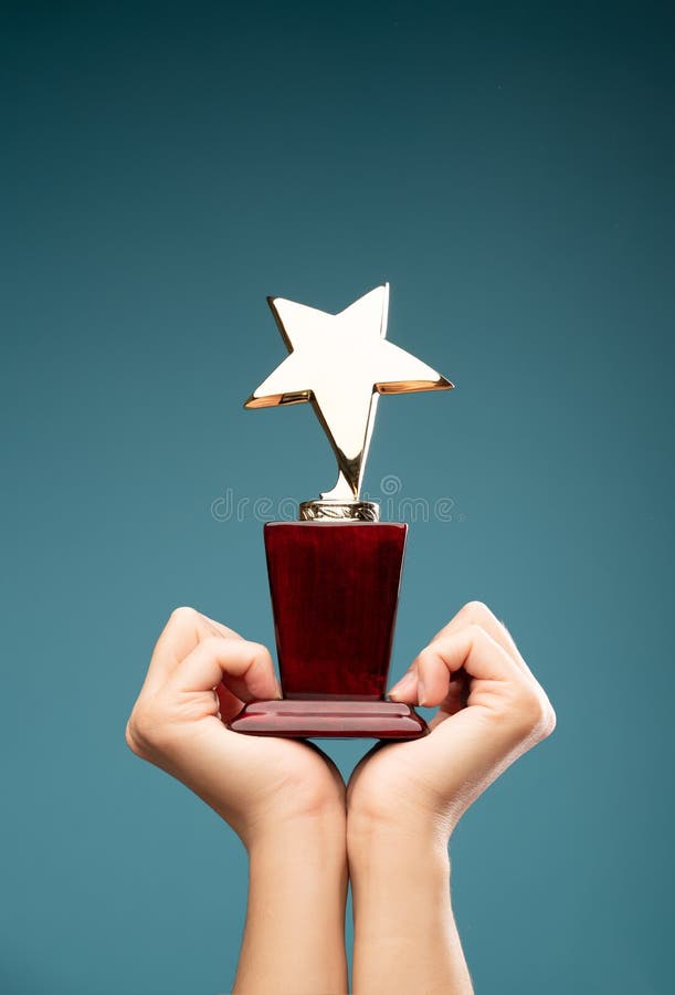 IImage of Hands of Man Raising Goblet with Star Stock Photo - Image of ...