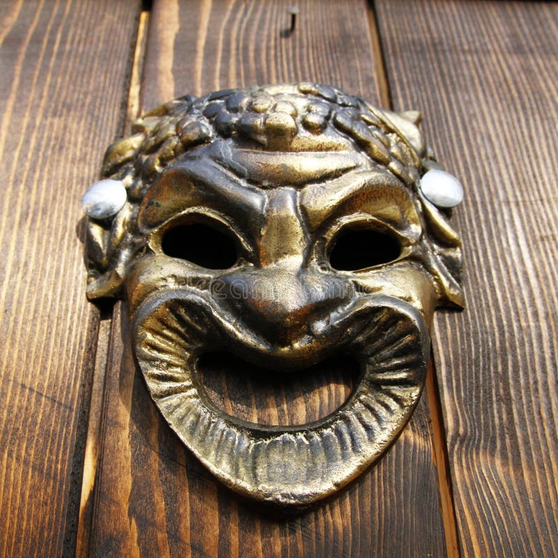 Il Bacco Maschera Sulla Porta Fotografia Stock - Immagine di colpi ...