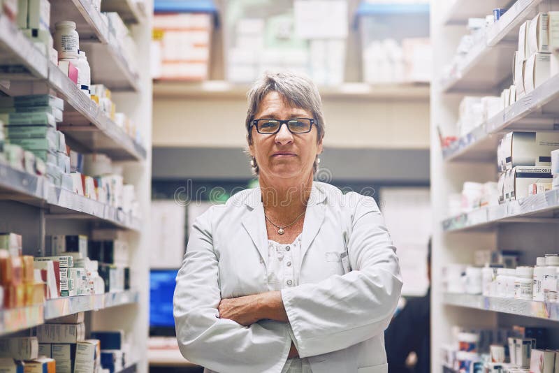 Ill Guide You through Whatever Your Problem is. a Pharmacist at Work ...