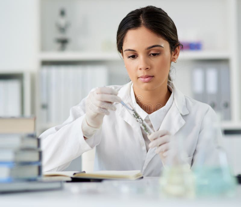 Ill Set these Aside for Testing Later. a Young Scientist Working with ...