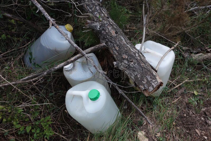 Illegal Dumping of Plastic Bottles Containing Liquid Stock Image ...