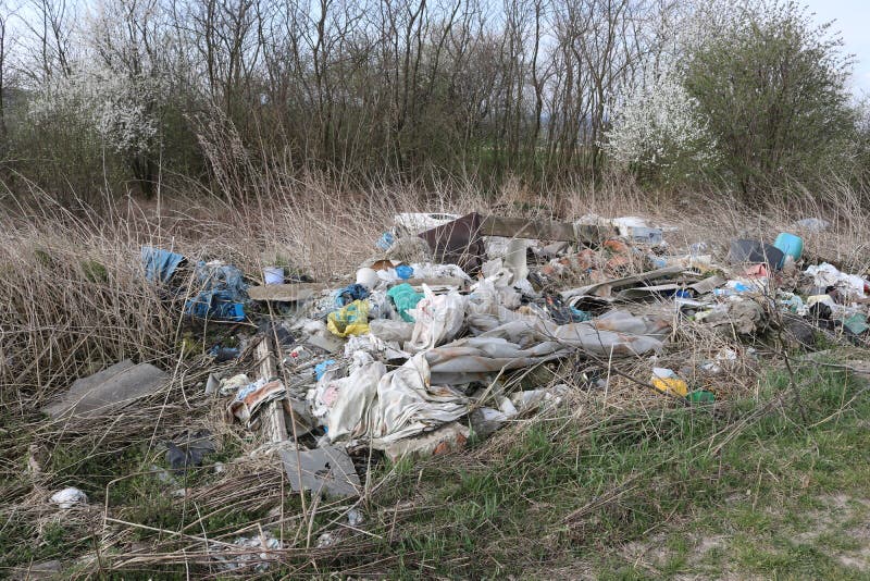 Illegal Garbage Dump among Fields and a Small Forest Stock Image ...