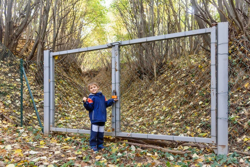 Illegal Gate on Fruska Gora Mountain in Serbia. the Boy is Standing by ...