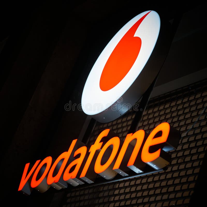 Illuminated Advertisement of the Mobile Phone Provider Vodafone in ...