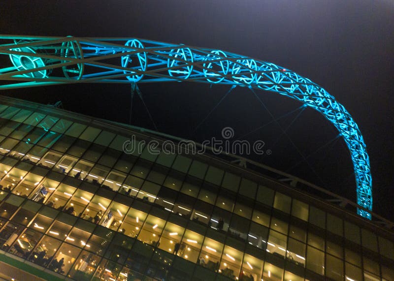 The Illuminated Arch of Wembley Stadium in London Editorial Photo ...