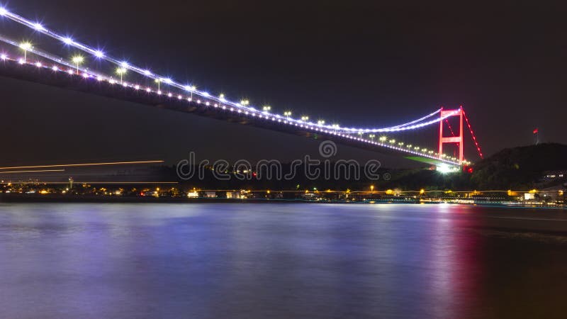 The Illuminated Bridge on the Bosphorus Strait Late at Night in ...
