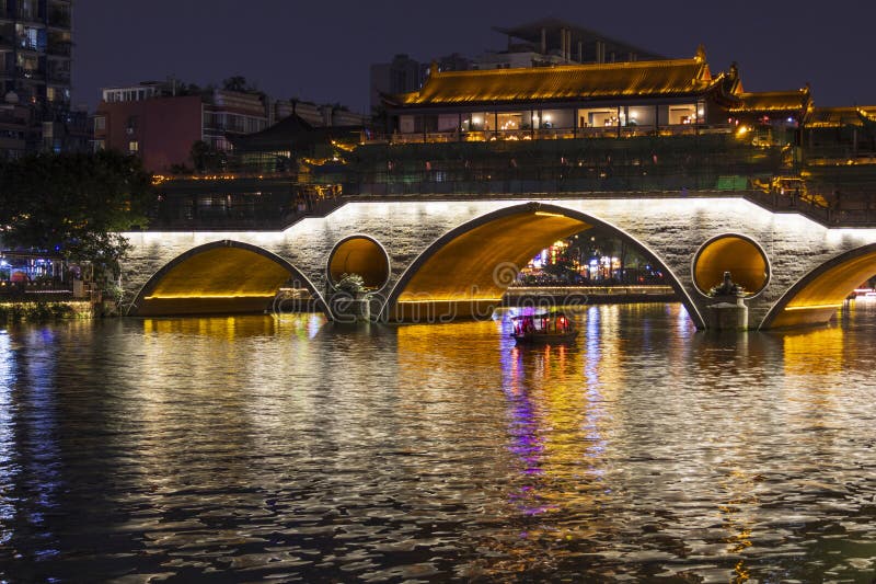 Illuminated Bridge Reflected in the River in Chengdu, China. Editorial ...