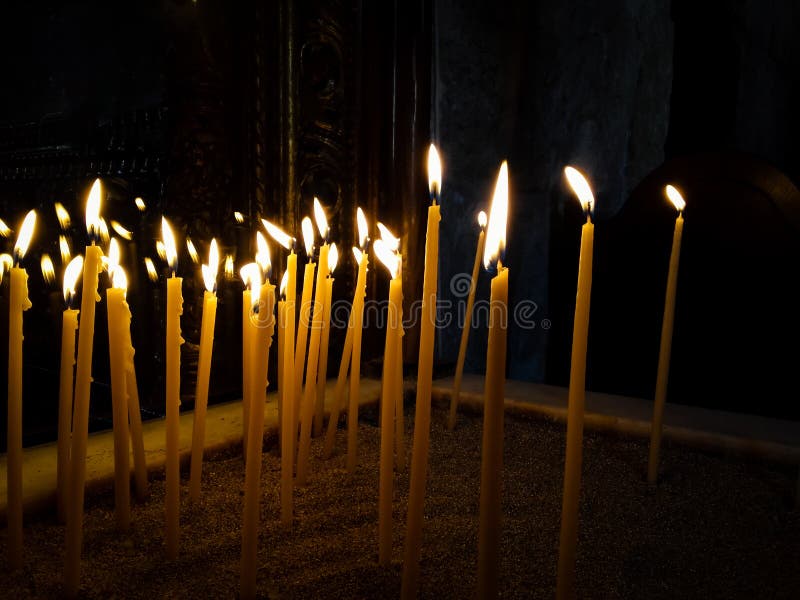 Illuminated Burning Candles in Temple and Churce Stock Photo - Image of ...