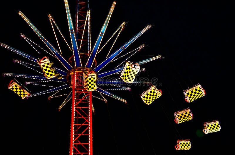 Illuminated Carousel Spinning with Black Background Editorial Stock ...