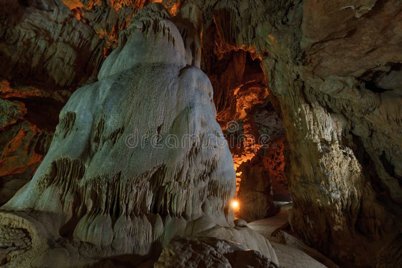 Illuminated Cave Interior with Rocks Stock Photo - Image of formation ...