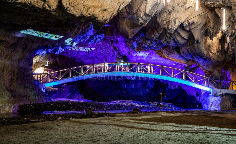 Illuminated Cave in Romania Pestera Bolii Stock Image - Image of ...
