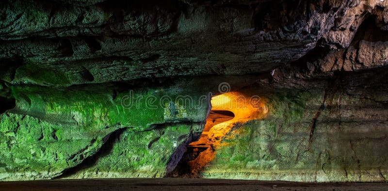 Illuminated Cave in Romania Pestera Bolii Stock Image - Image of rock ...