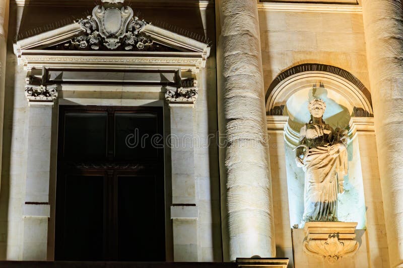 Illuminated Classical Statue and Ornate Architecture at Night Editorial ...