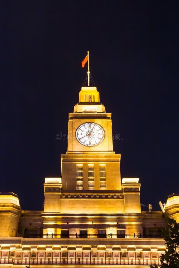 Illuminated Clock Tower on the Custom Building in Shanghai Stock Photo ...