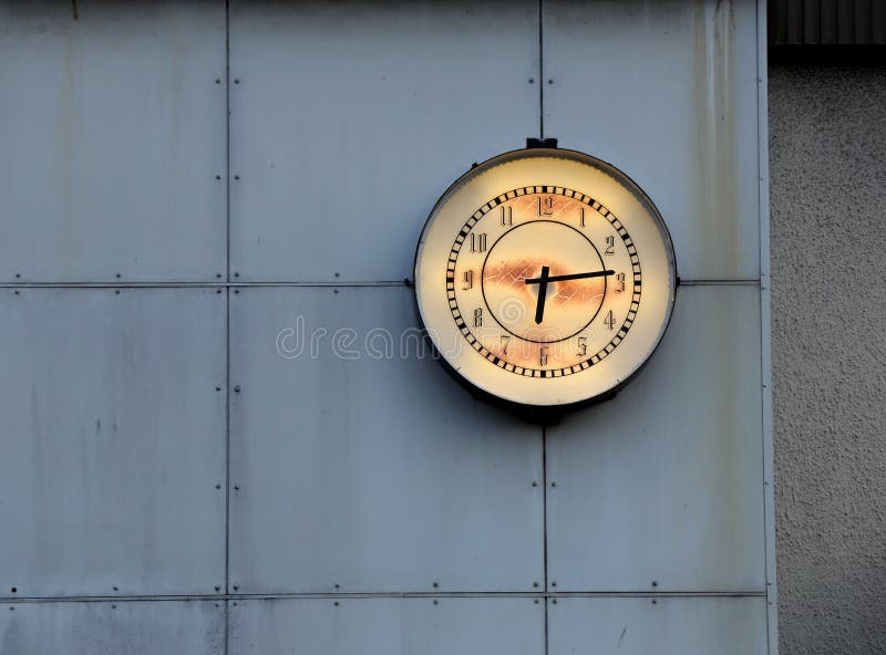 Illuminated Clock on the Wall Stock Image - Image of grey, dirty: 144758155