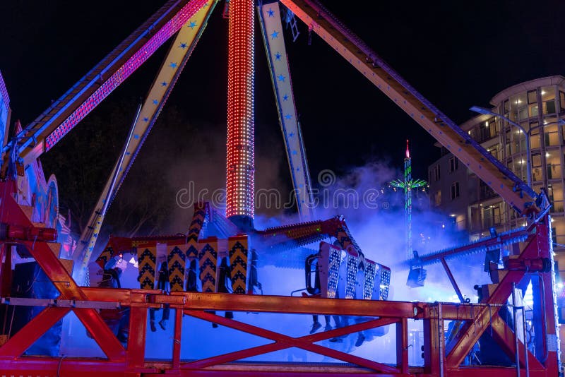 Illuminated Colorful Attraction at the Fair at Night Editorial ...