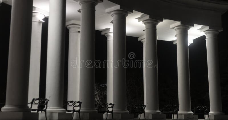 Illuminated Columns with White Light. Many Columns on the House Stock ...