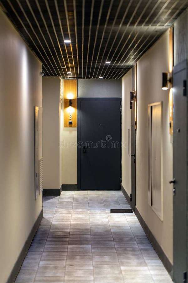 Illuminated Corridor in Modern Residential Building. Illuminated ...