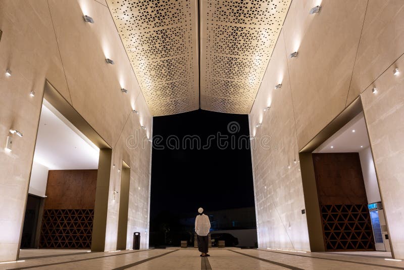 Illuminated Courtyard of Mosque of Light in Dubai with Muslim Woman ...