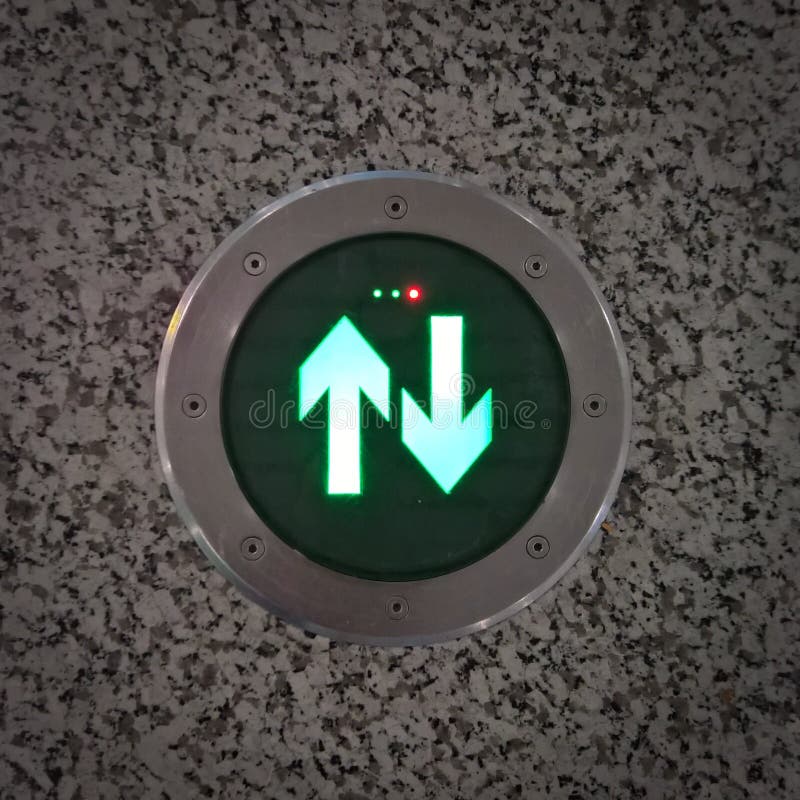 Illuminated Direction Marker Stock Photo - Image of green, alon: 93360810