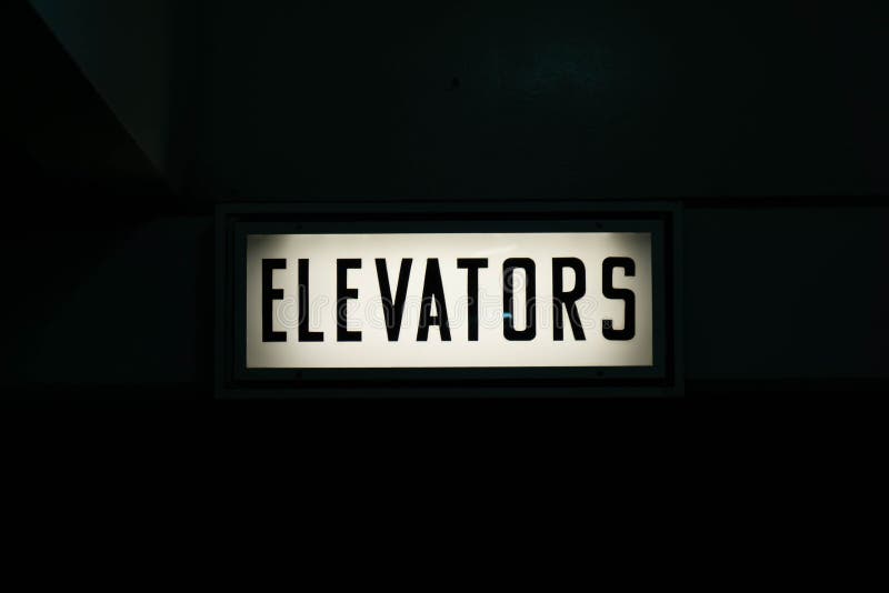 Illuminated Elevators Sign editorial stock image. Image of sings ...