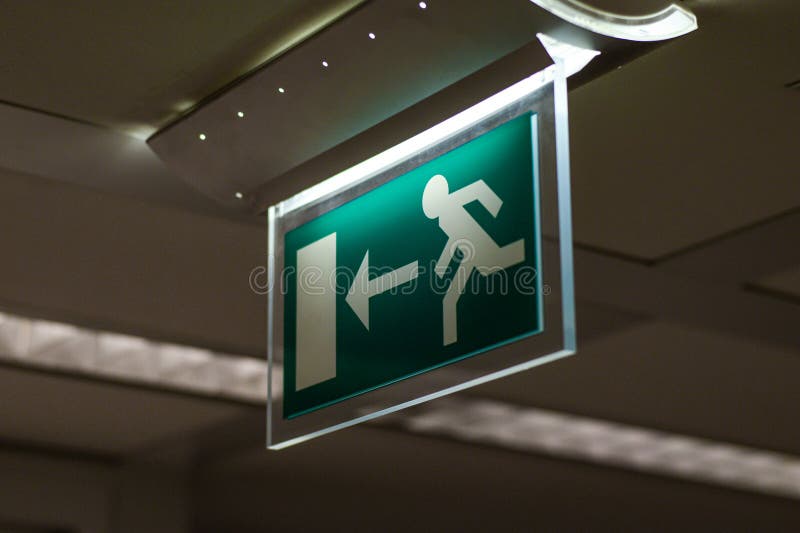 Illuminated Emergency Exit Sign Stock Photo - Image of building ...