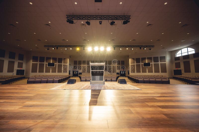 Illuminated Empty Hall with a Stage and Empty Seats. Stock Image ...