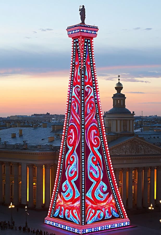 Illuminated Festive Pyramid Tower at Dusk Cityscape High Quality Image ...