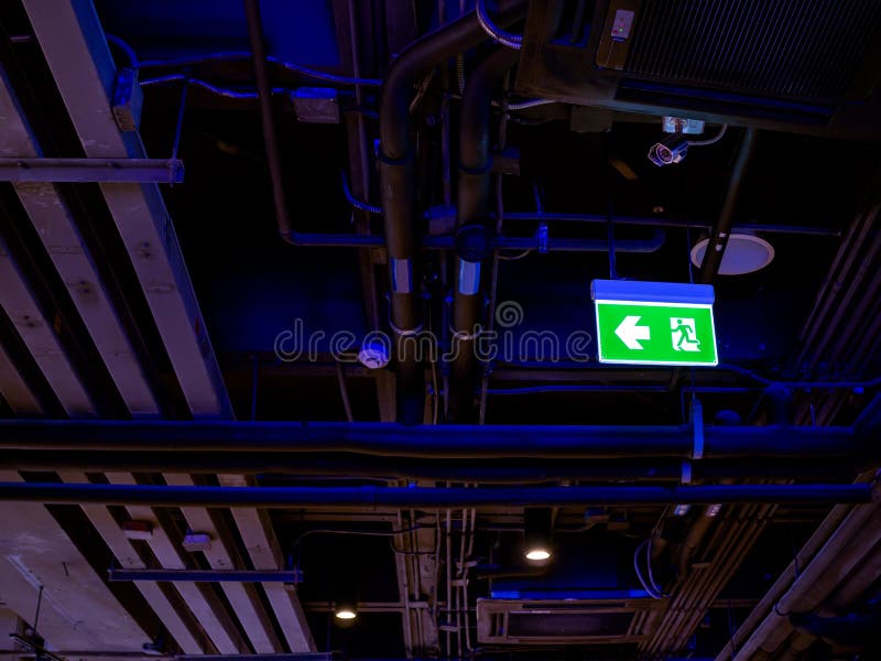 Illuminated Green Fire Exit LED Light Sign Stock Image - Image of ...