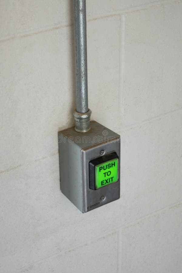 Illuminated Green Push To Exit Button on Wall Stock Photo - Image of ...